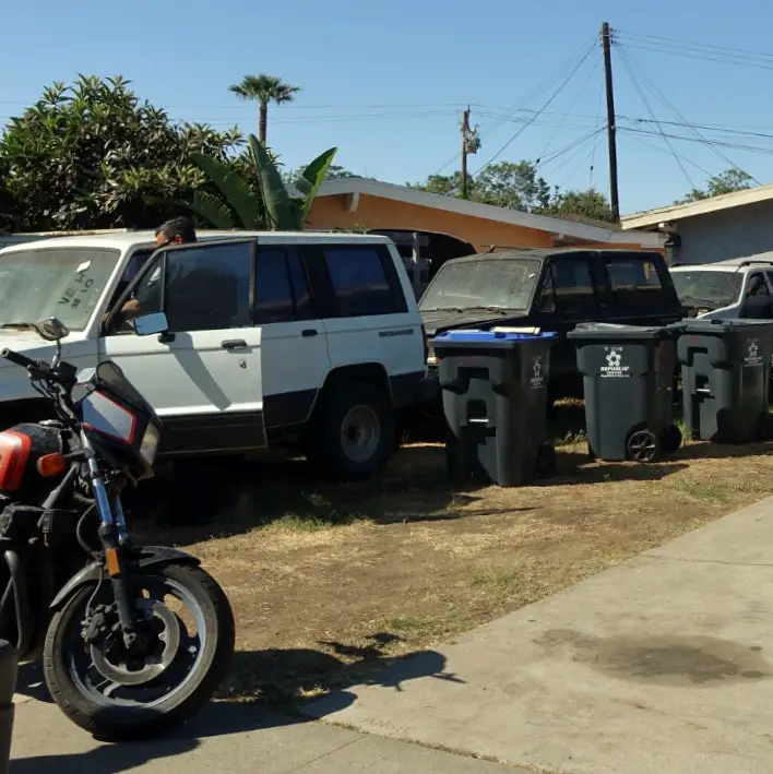 Santa Ana Code Enforcement hauled off 30 junk vehicles from a residence ...